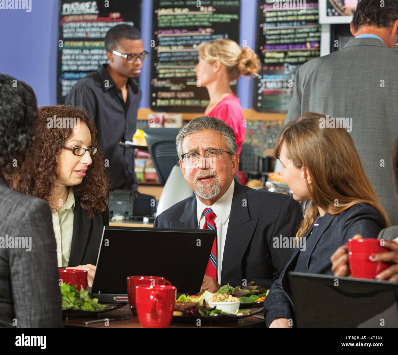 Executives Eating Lunch Stock Photo - Alamy