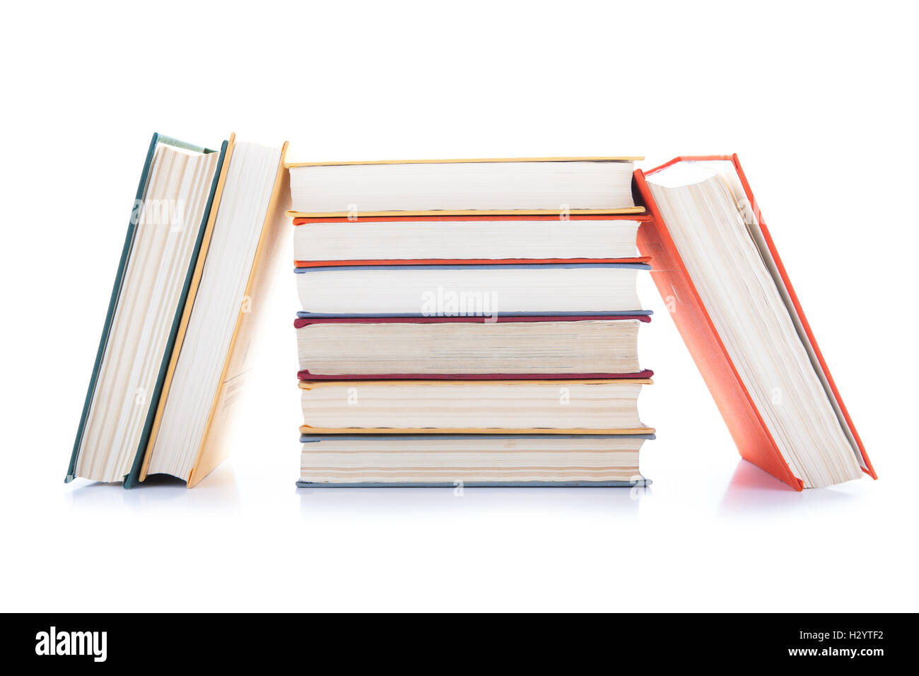 stack of books on white Stock Photo - Alamy