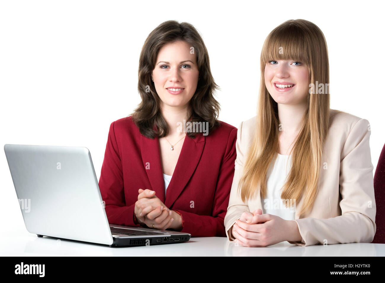 Two women laptop Stock Photo - Alamy
