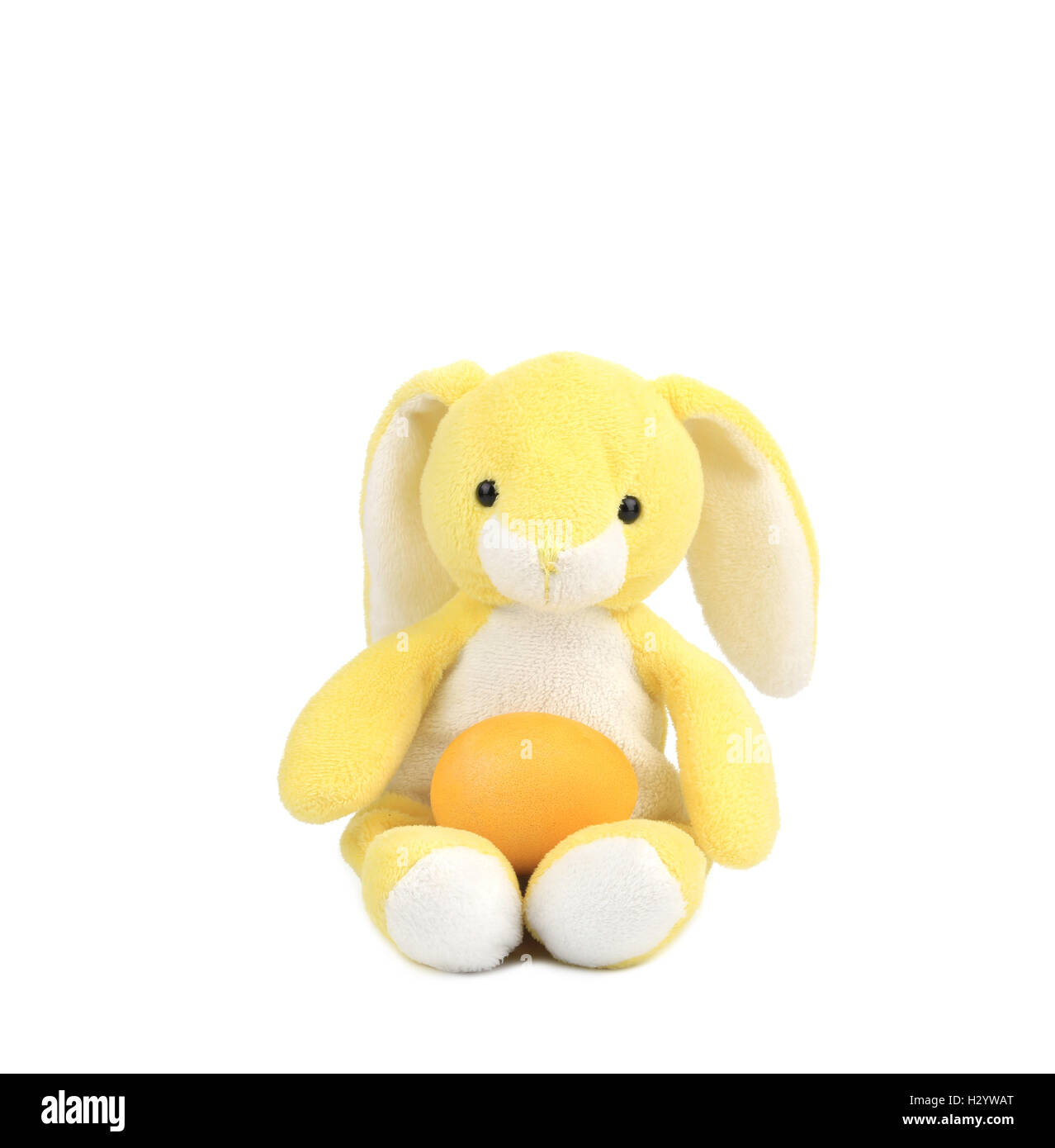 Fluffy foxy rabbit in basket with Easter egg Stock Photo - Alamy