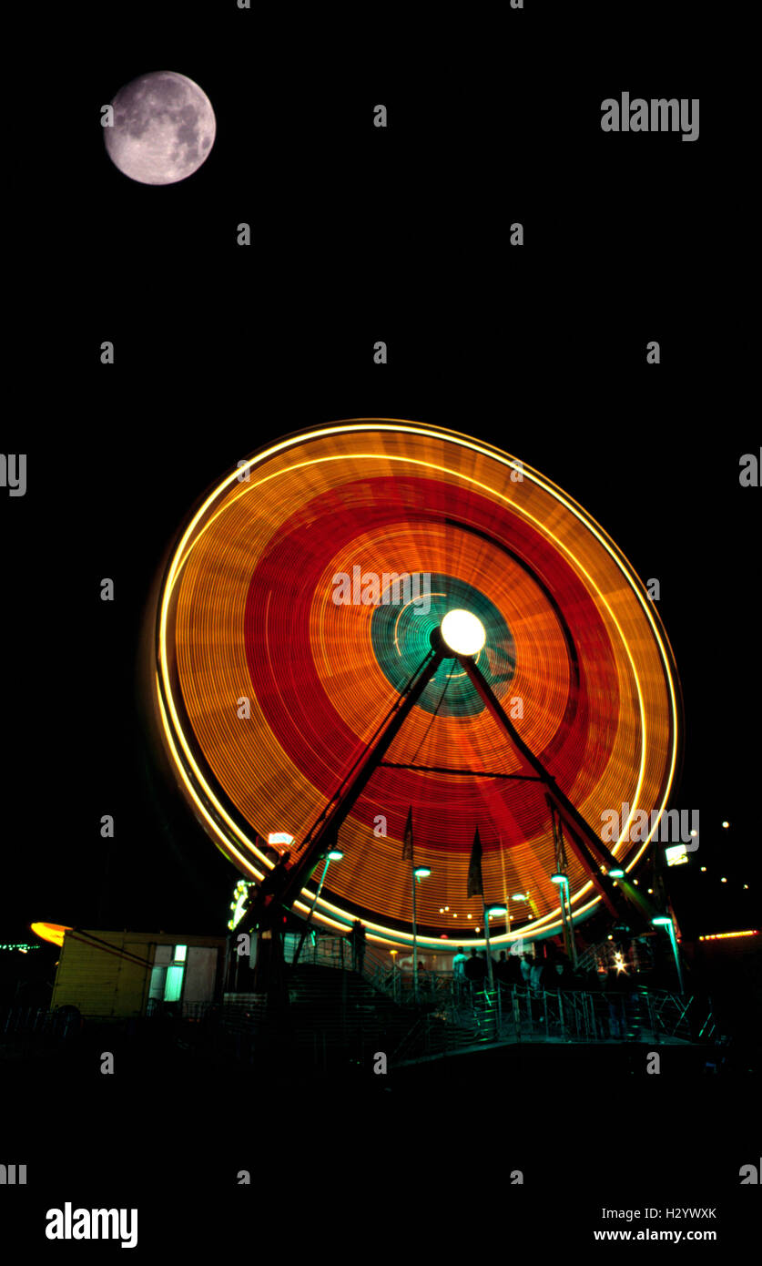 Fair Moon Full Lunar Showing over Local Fair Midway Canival Ride Stock ...