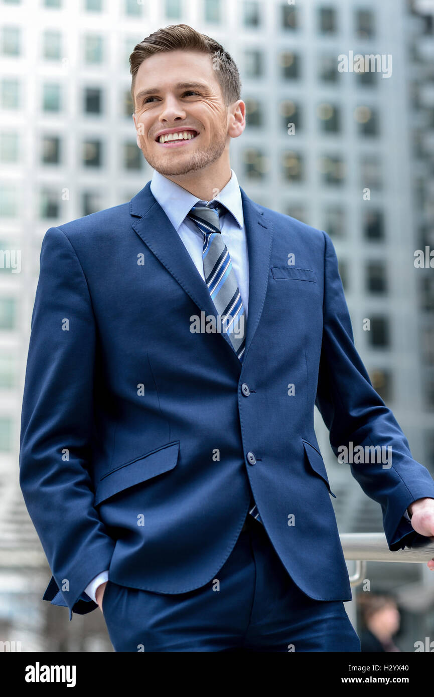 Handsome businessman posing at outdoors Stock Photo - Alamy Handsome businessman posing at outdoors Stock Photo - Alamy