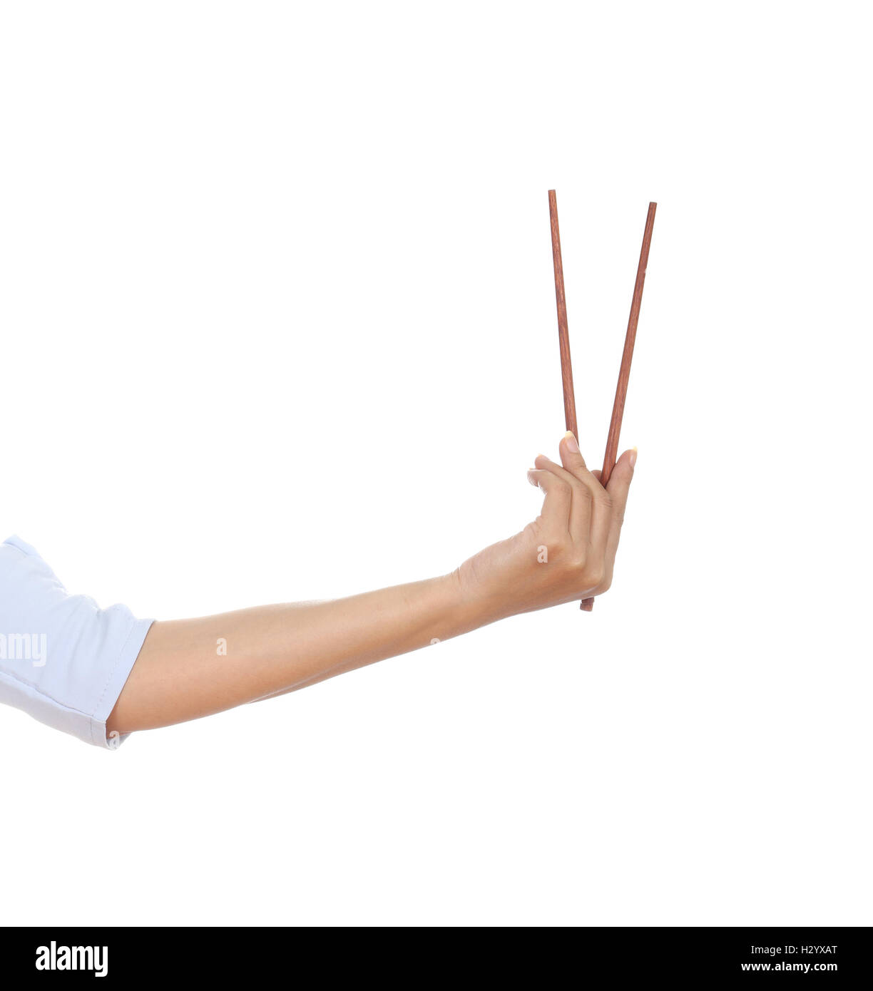 Chopsticks in a hand Stock Photo - Alamy