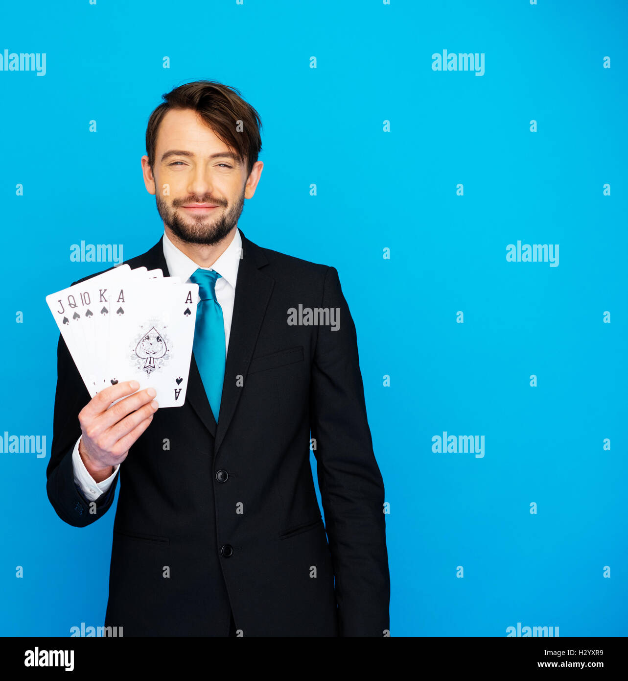 Businessman with pack of cards hi-res stock photography and images - Alamy