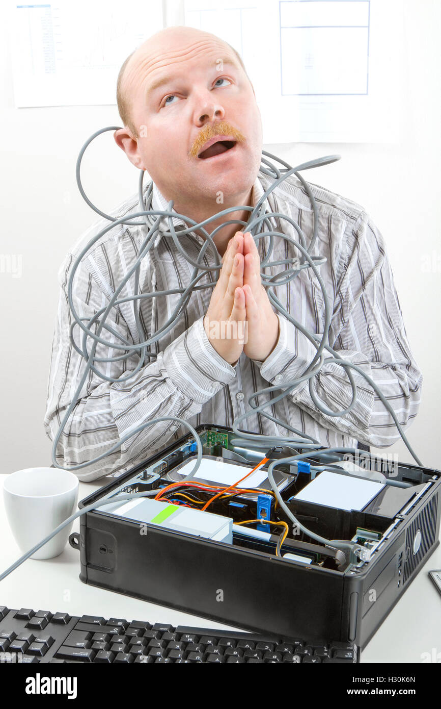Praying at desk hi-res stock photography and images - Alamy