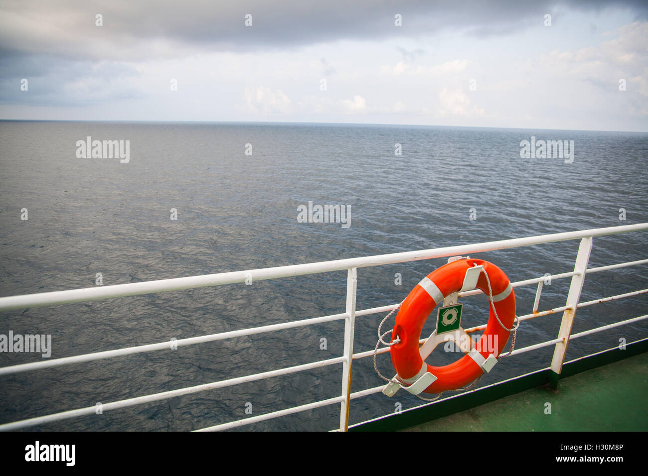 Color image lifebuoy on boat hi-res stock photography and images - Alamy