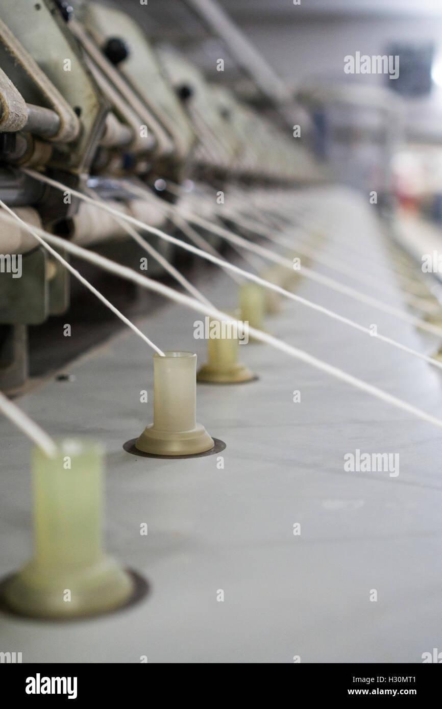 Thread making machine inside cotton mill Multan Pakistan Stock Photo ...