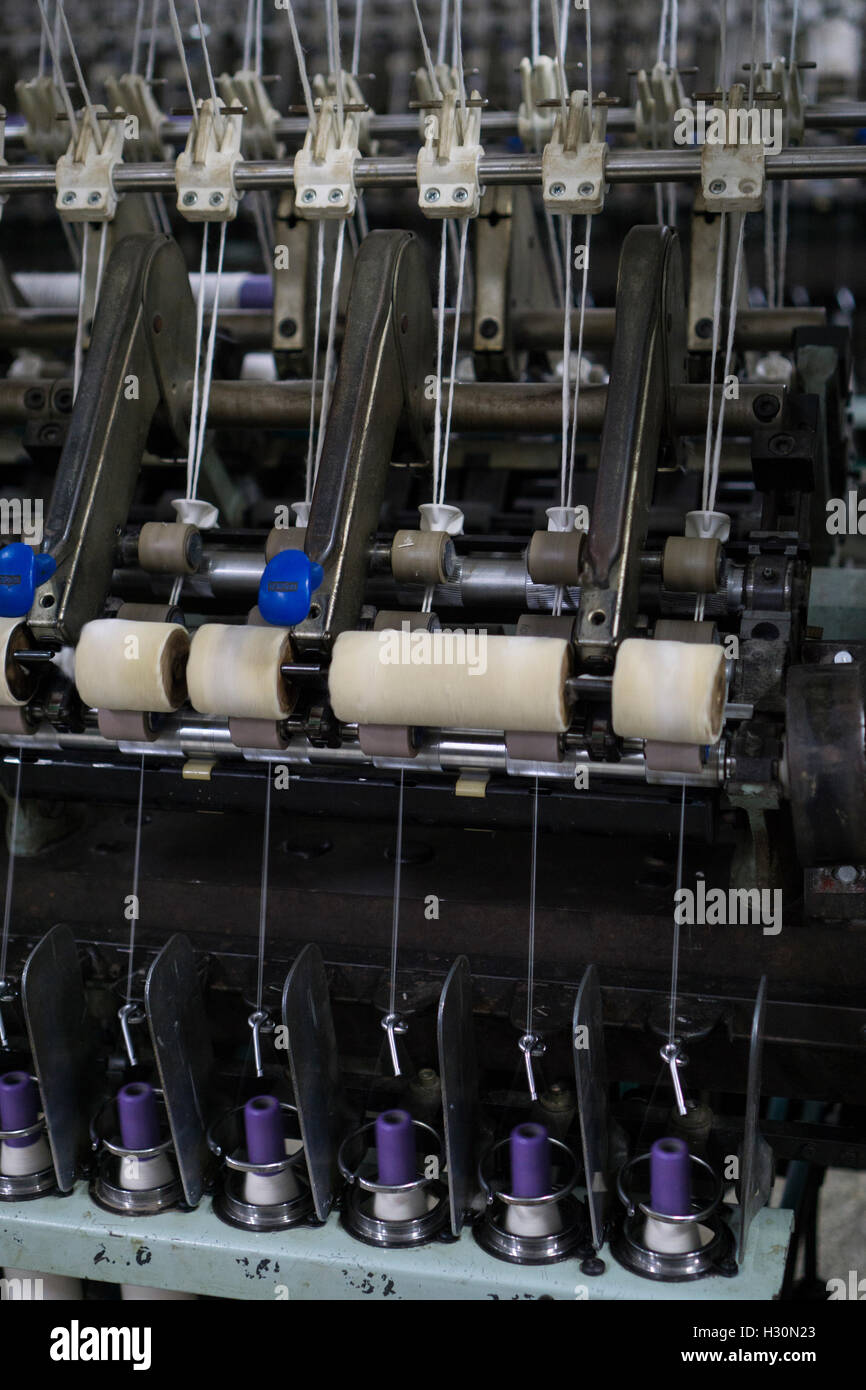 Cotton spools inside cotton mill Multan Pakistan Stock Photo - Alamy