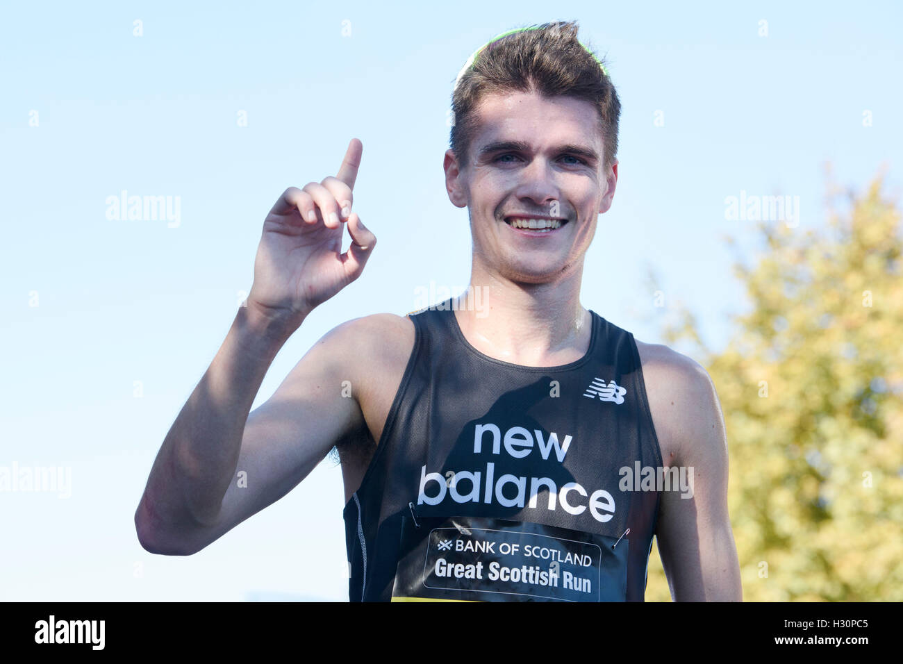 Scottish runner Callum Hawkins celebrates his victory in the Elite Half ...