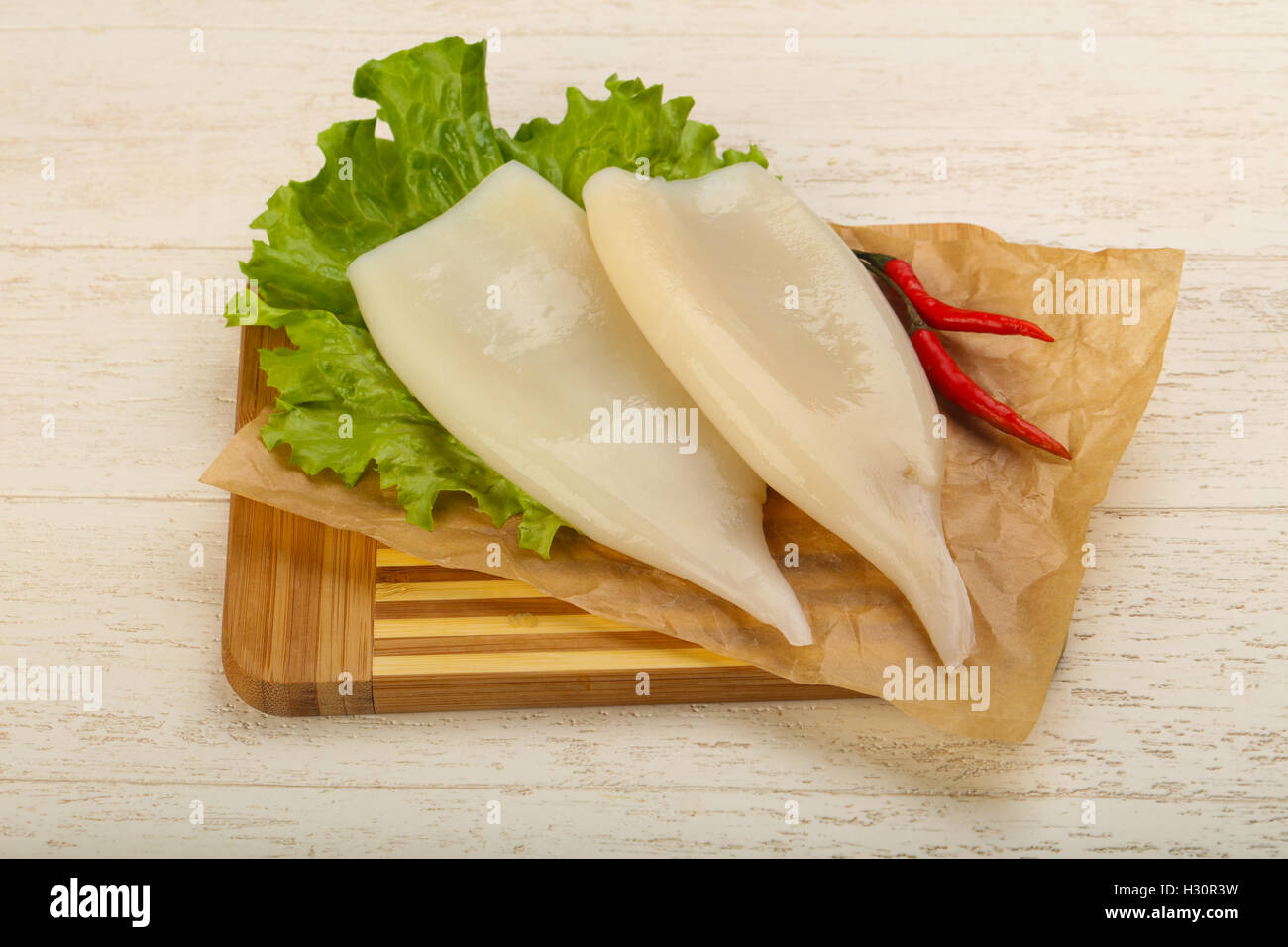 Raw squid fillet ready for cooking Stock Photo - Alamy