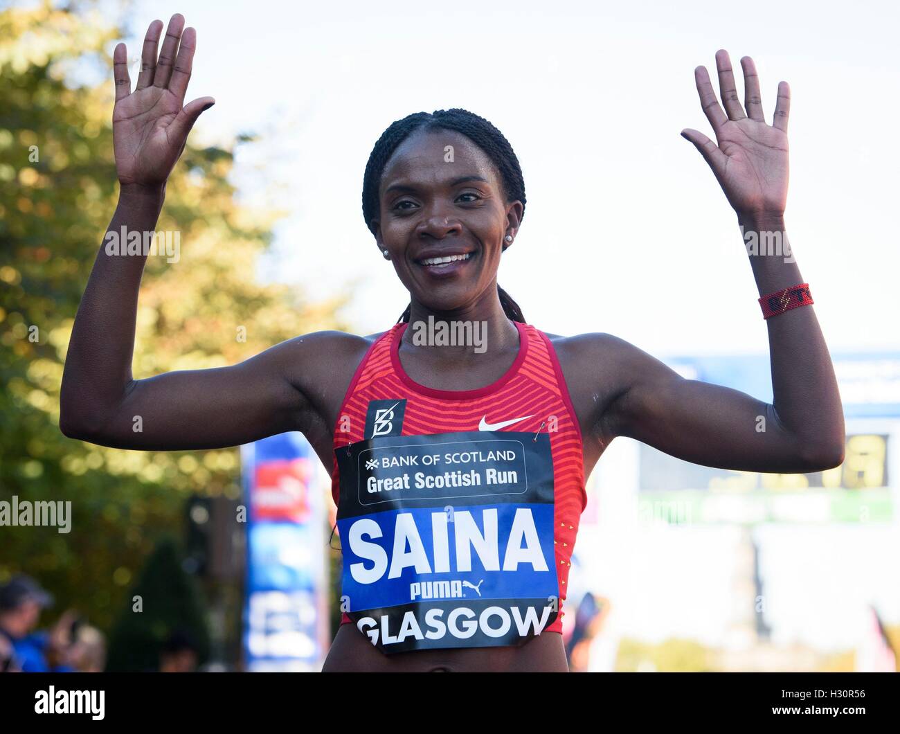 Kenyan athlete Betsy Saina celebrates her victory in the women's Elite ...