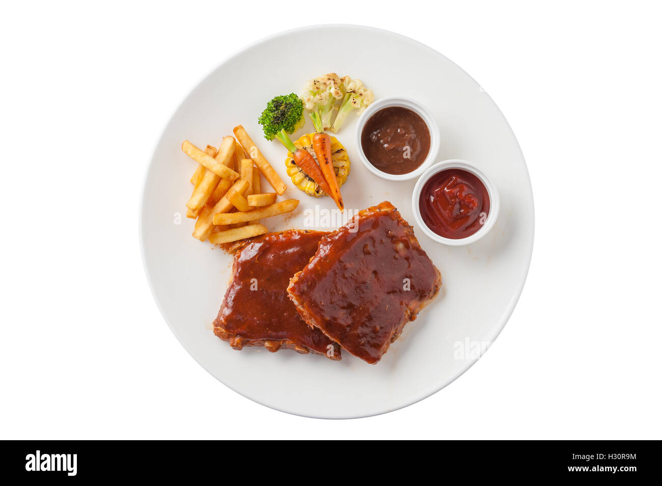Top view of American style barbecue ribs steak with french fries ...