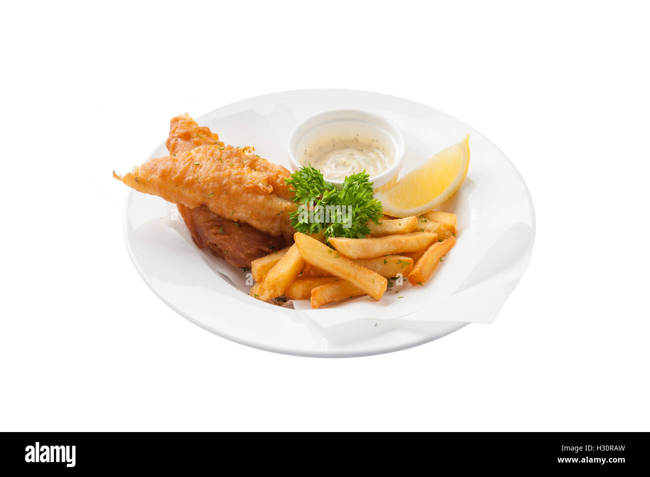 Front view of Traditional British style fish and chips including deep ...