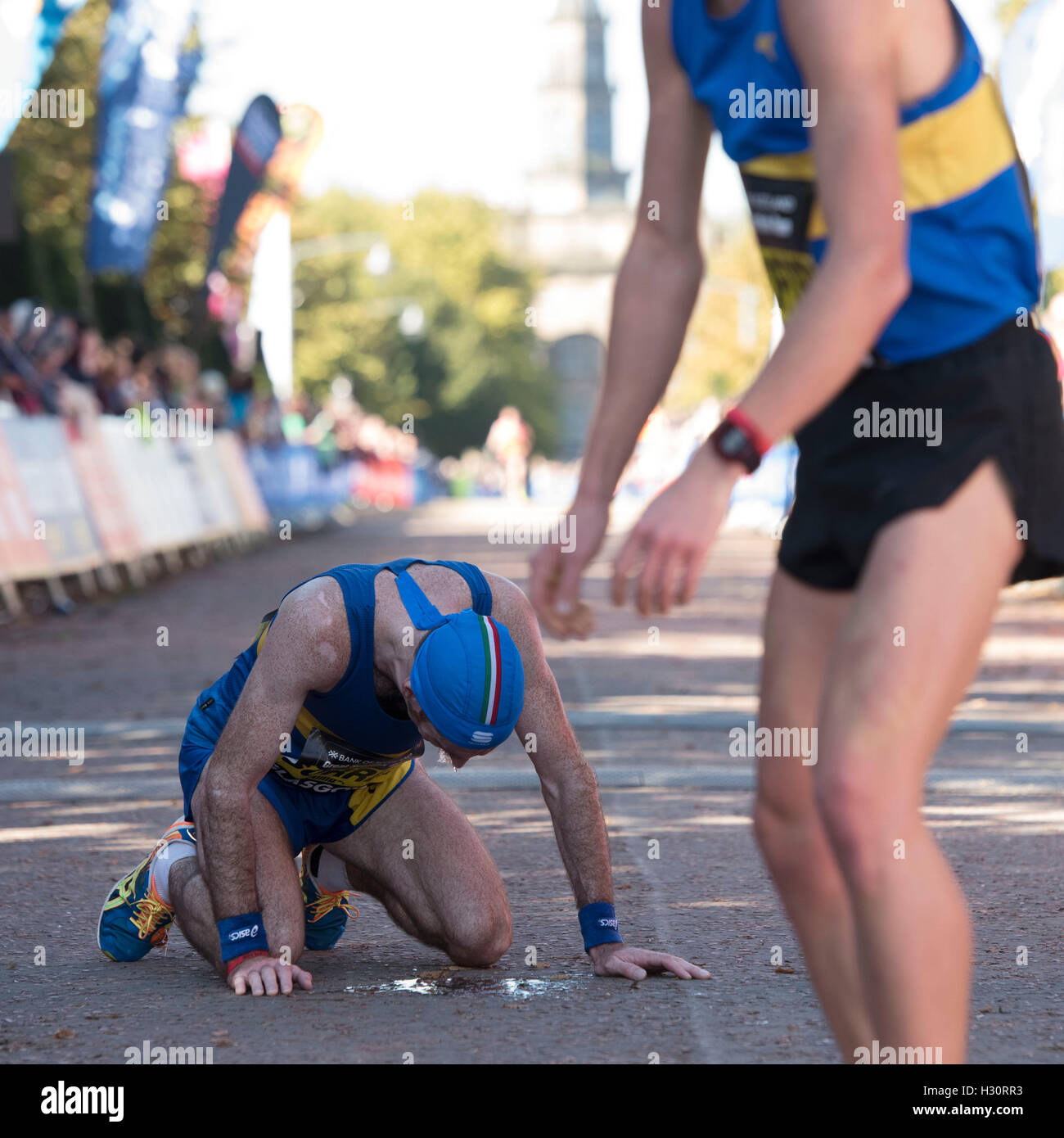 Runners at the finish line of the Elite Half Marathon race at the Great ...