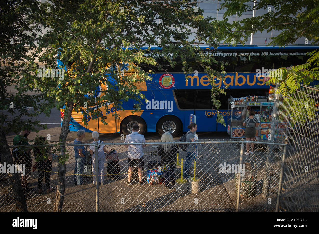 New York, NY, USA. 13th Sep, 2016. Passengers board a Megabus on 34th ...