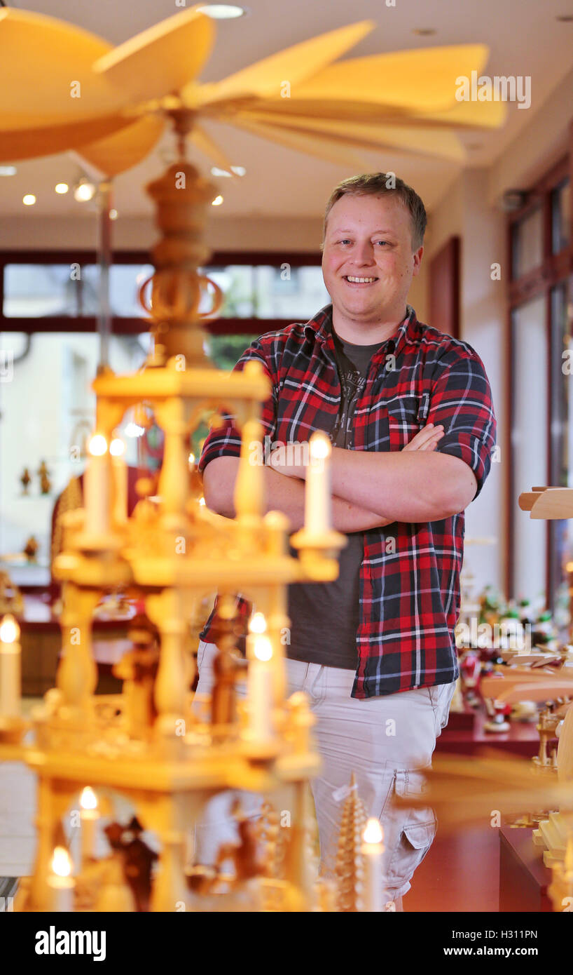 Seiffen, Germany. 19th Sep, 2016. Tim Gruber stands in the show room of ...