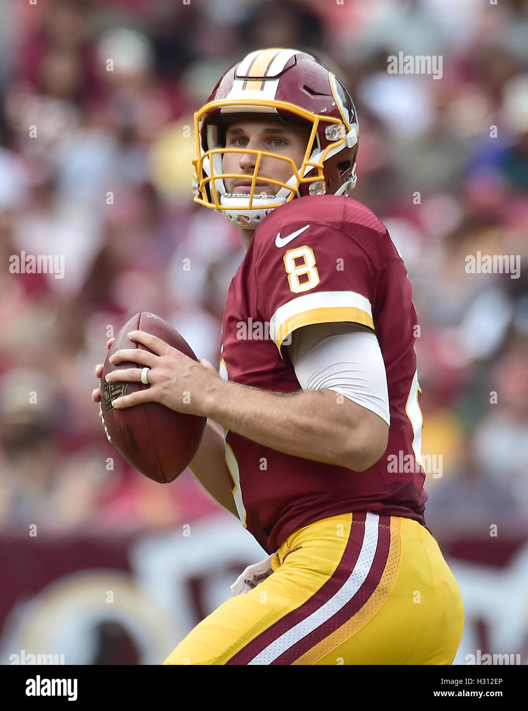 Washington Redskins quarterback Kirk Cousins (8) looks for a receiver ...