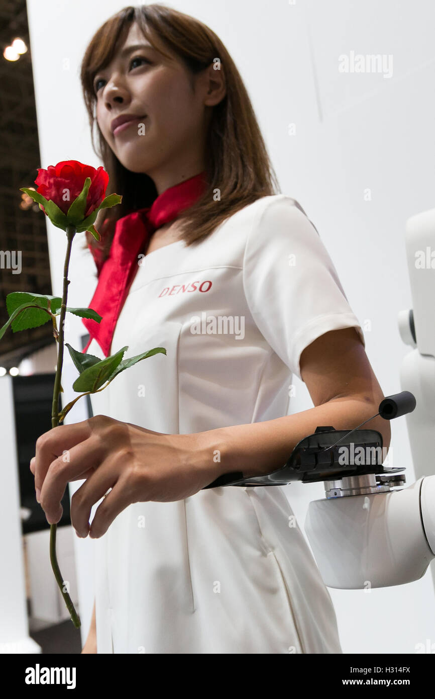 Tokyo, Japan. 3rd Oct, 2016. An exhibitor gives a demonstration of a ...