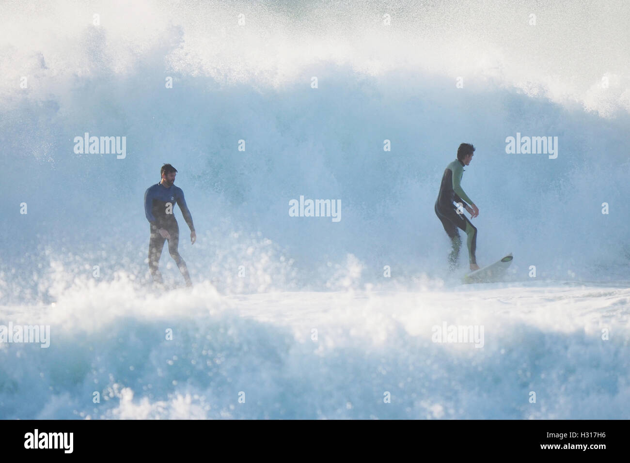 Surfer rides big green ocean hi-res stock photography and images - Alamy