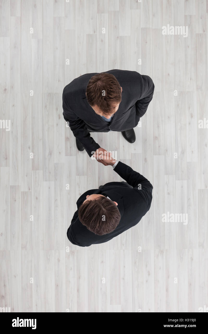 Business handshake top view hi-res stock photography and images - Alamy