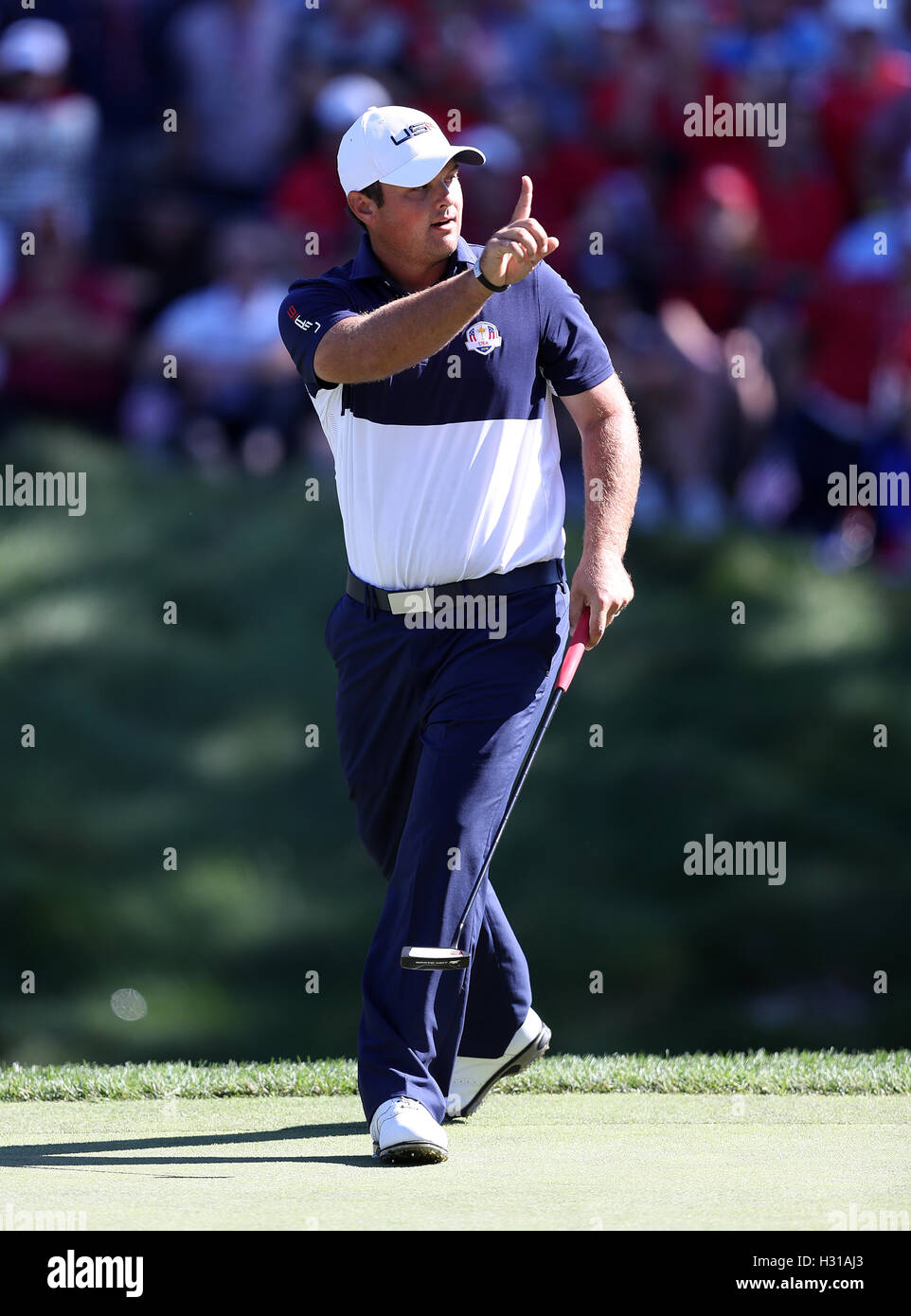 USA's Patrick Reed celebrates his putt on the 8th during the singles ...