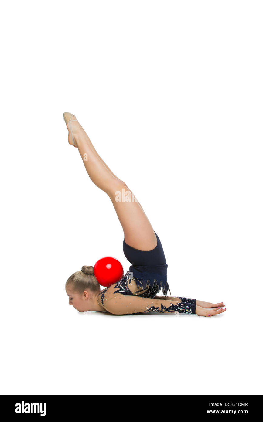 Beautiful gymnast girl with red ball Stock Photo - Alamy