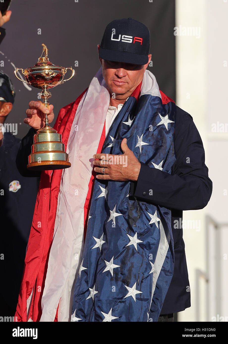 USA team captain Davis Love III celebrates with the Ryder Cup after the ...
