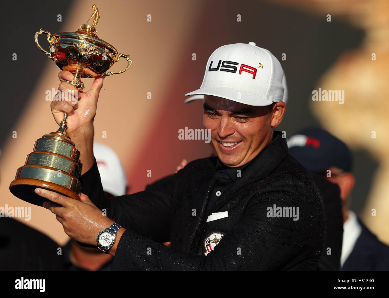 USA's Rickie Fowler celebrates with the trophy after the USA won the ...