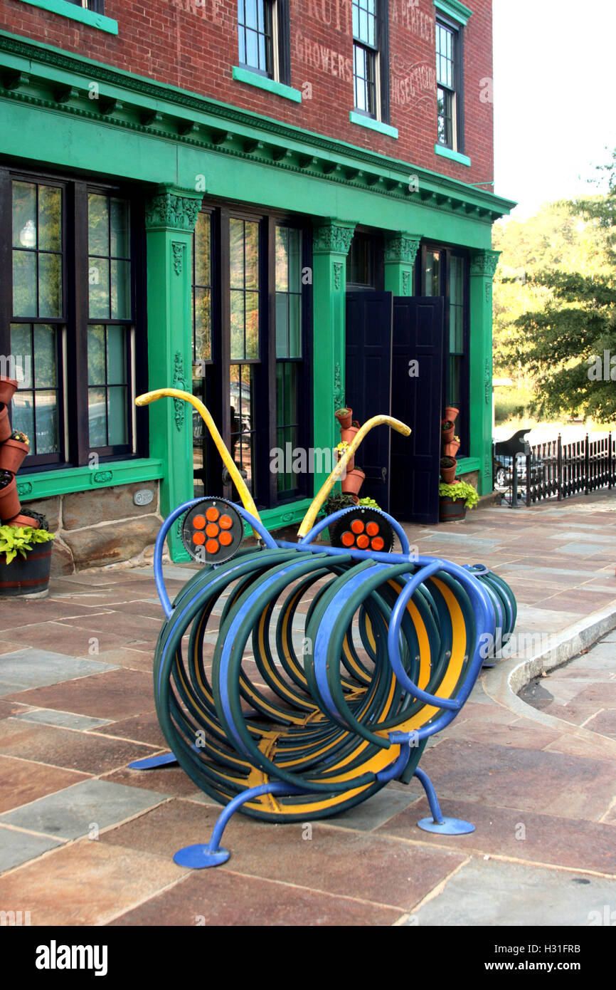 The caterpillar bike rack named “Spirals” in front of the Amazement ...