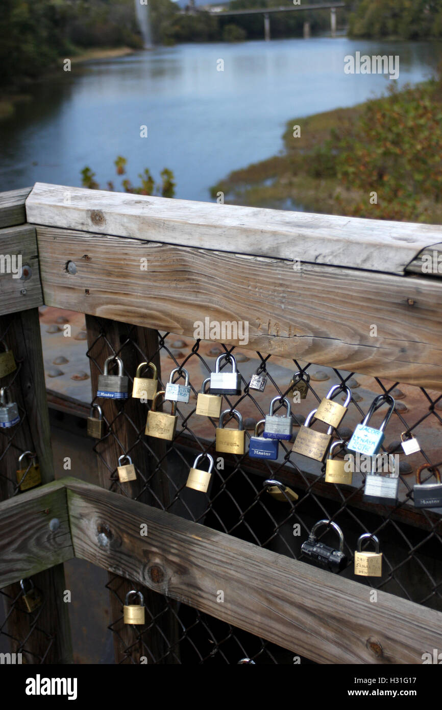 Locks hanged by people on the bridge over James River on Lynchburg ...