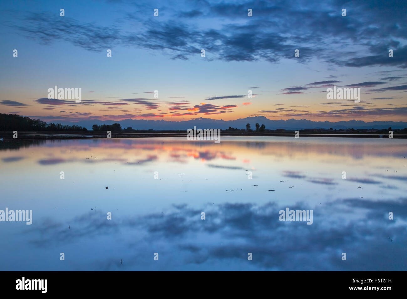 Sunset over rice fields near novara hi-res stock photography and images ...