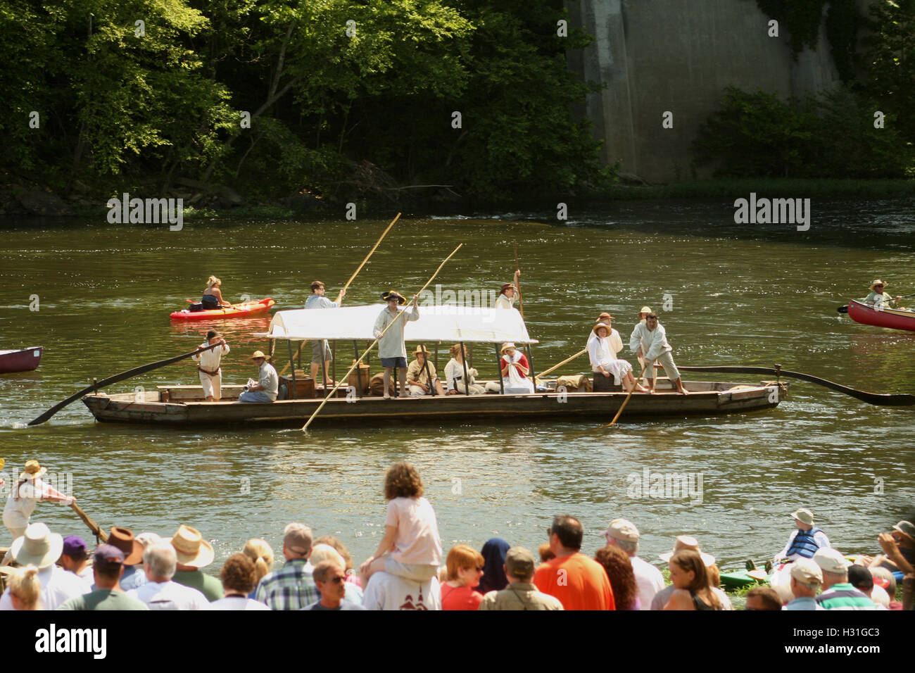 Replica of an 18th & early 19th century cargo boat, called a batteau, floating at the James ...
