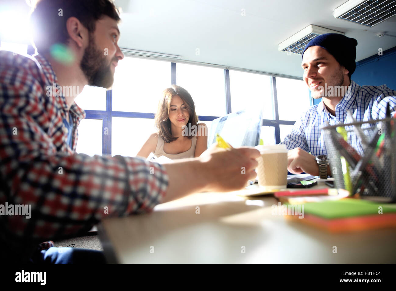 Team job. Photo young businessmans crew working with new startup ...