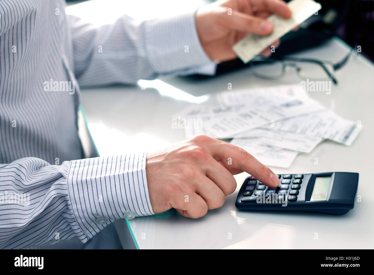 Businessman counting bills. Work in office Stock Photo - Alamy