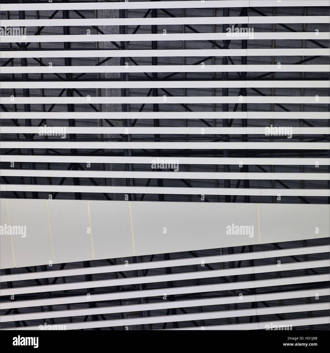 Office building roof pattern detail. Square format Stock Photo - Alamy