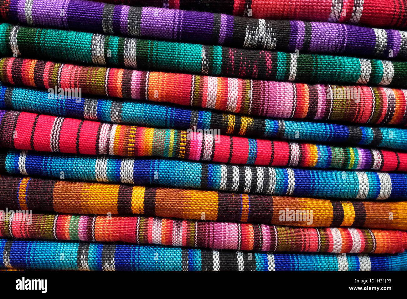 A display of tzutes or traditional utility cloths for sale at the ...