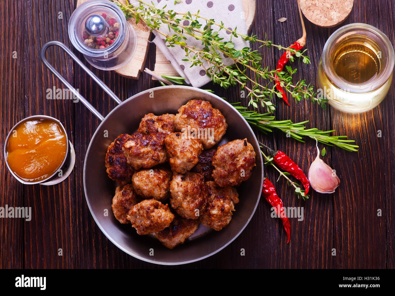 fried meat balls in pan and on a table Stock Photo - Alamy