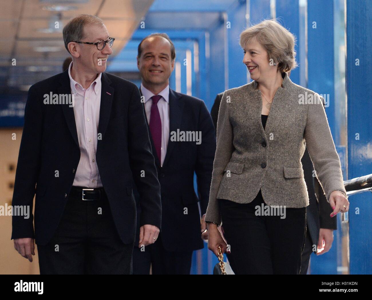 Prime Minister Theresa May and her husband Philip arrive on the second ...