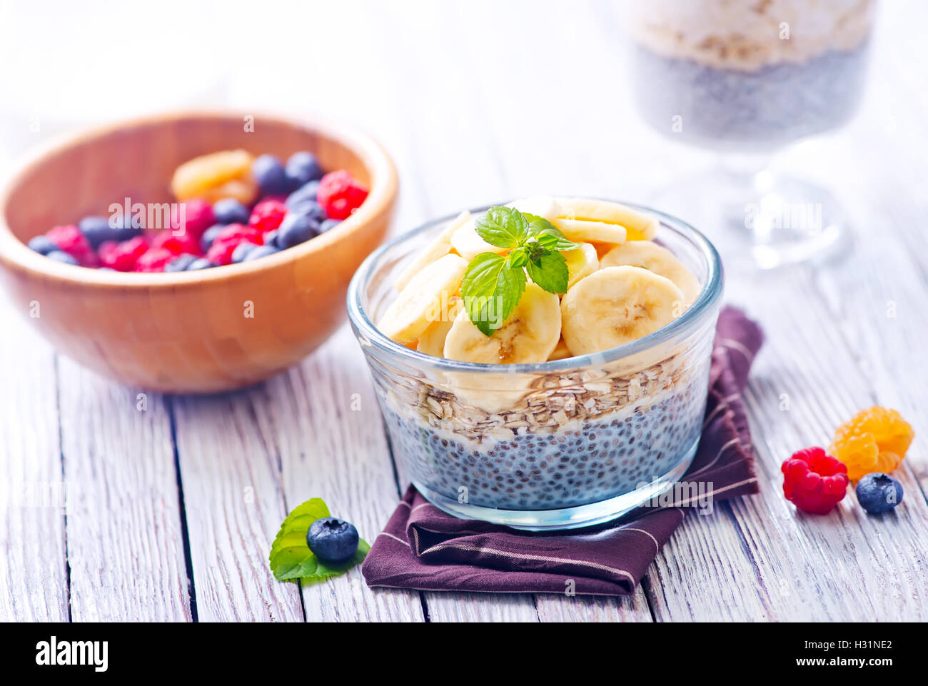 Chia pudding with fresh berries in the glass Stock Photo - Alamy