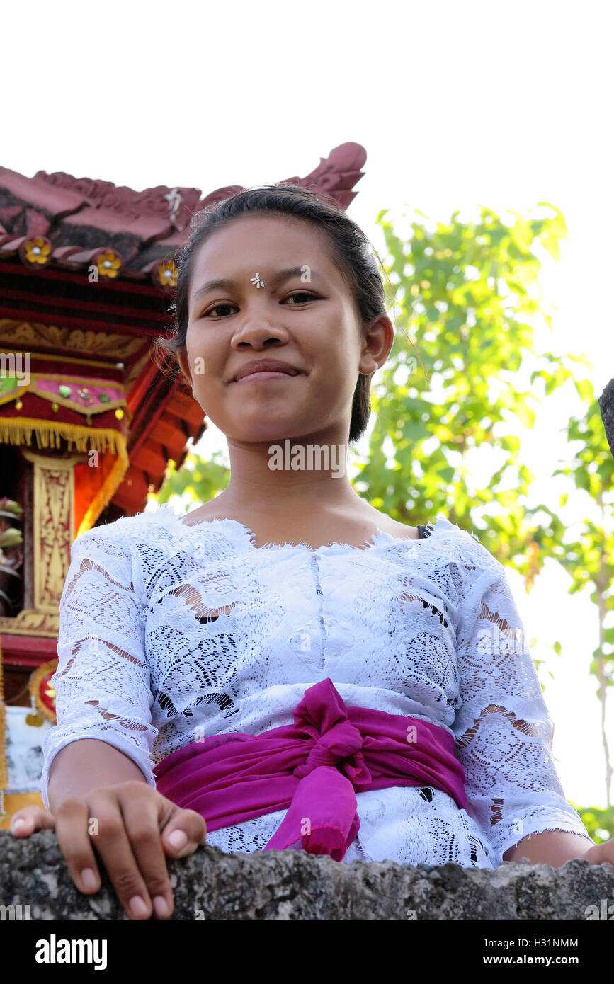 Indonesia, Bali, Amed, young girl dressed in traditional clothes for ...