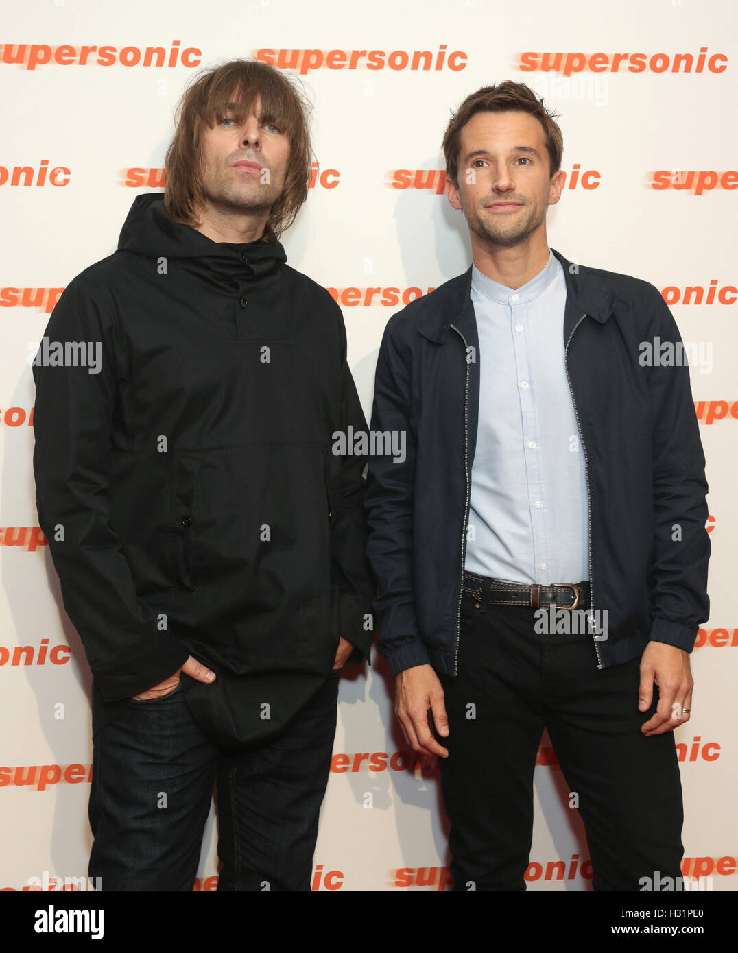 Liam Gallagher (left) and director Mat Whitecross arriving for a ...