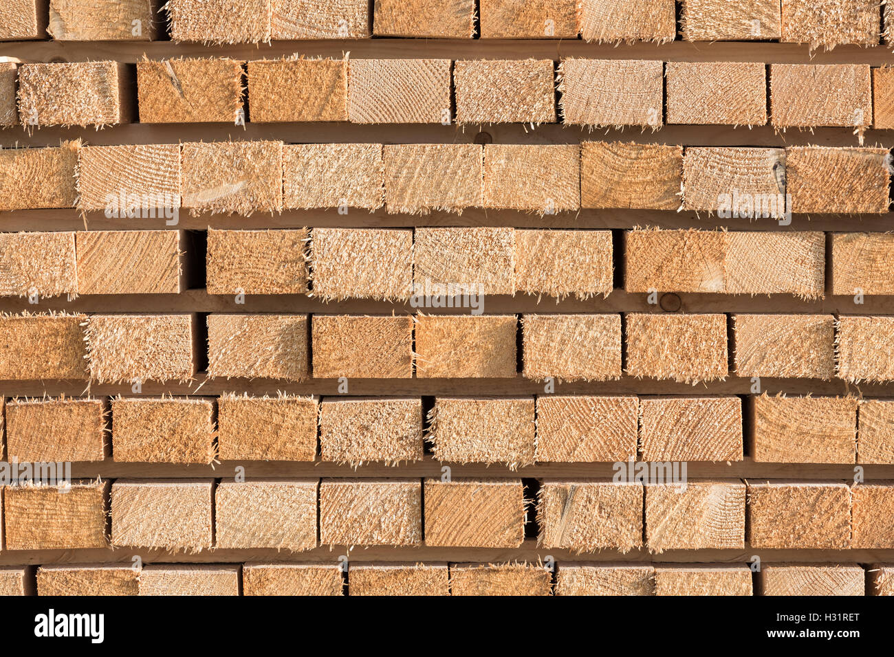 Stack of new wooden studs at the lumber yard Stock Photo - Alamy
