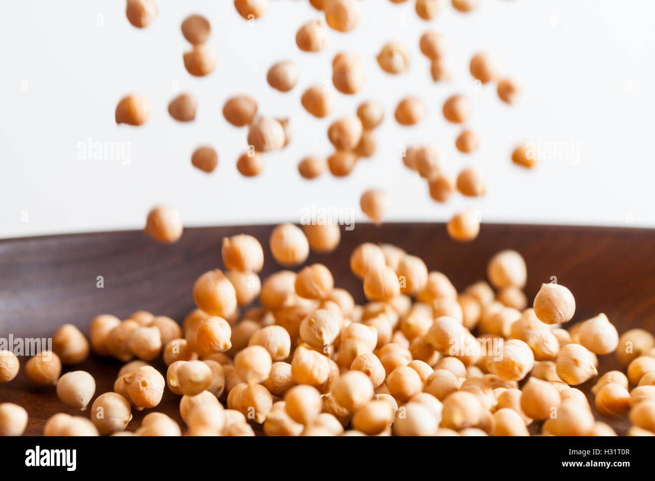 Dried Chickpeas Falling Stock Photo - Alamy