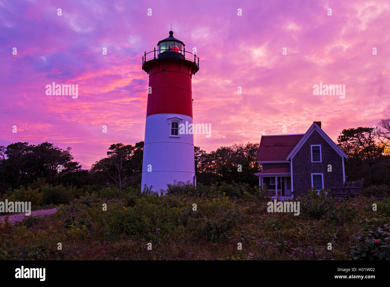 Nauset Lighthouse purple sunset in Cape Cod-Massachusetts Stock Photo ...