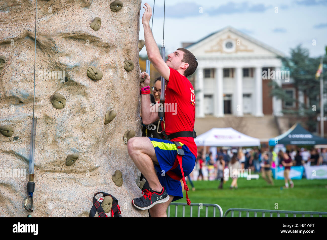Students rock climbing outside at University of Maryland, College Park ...