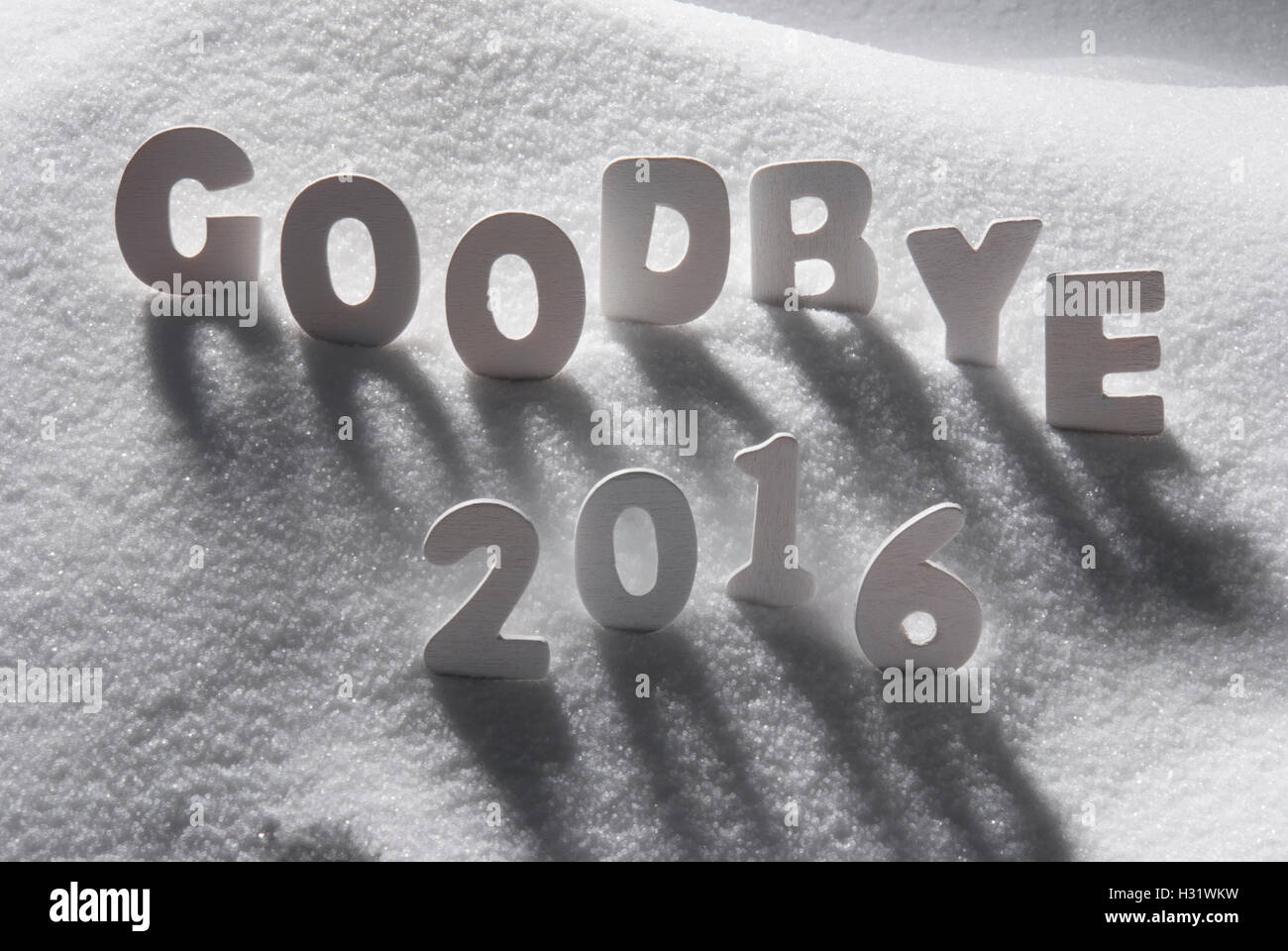 Text Goodbye 2016 With White Letters In Snow Stock Photo - Alamy