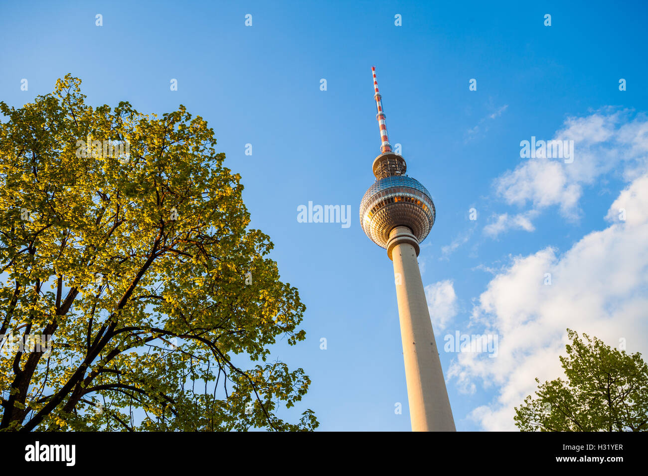 The Fernsehturm (TV Tower) seen at Berlin's Alexanderplatz from below ...
