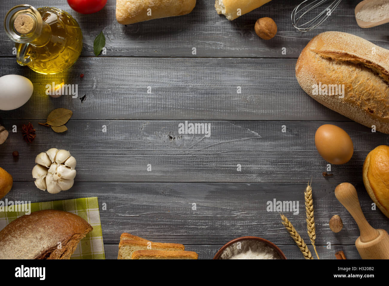 bread and bakery products on wood background Stock Photo - Alamy