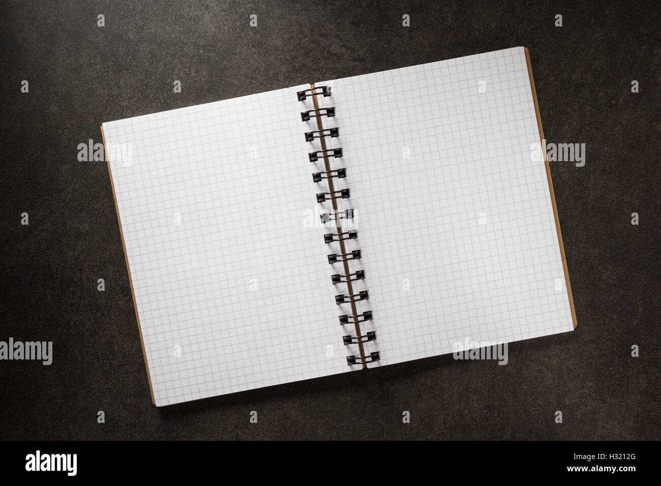 checked notebook on background texture Stock Photo - Alamy