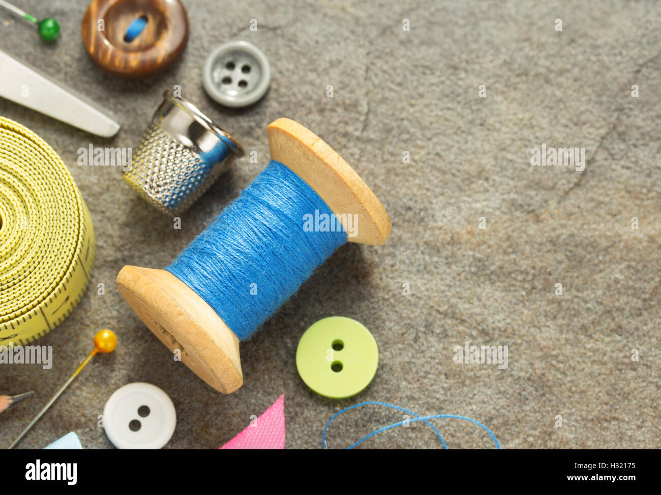 sewing tools and accessories on table background Stock Photo - Alamy